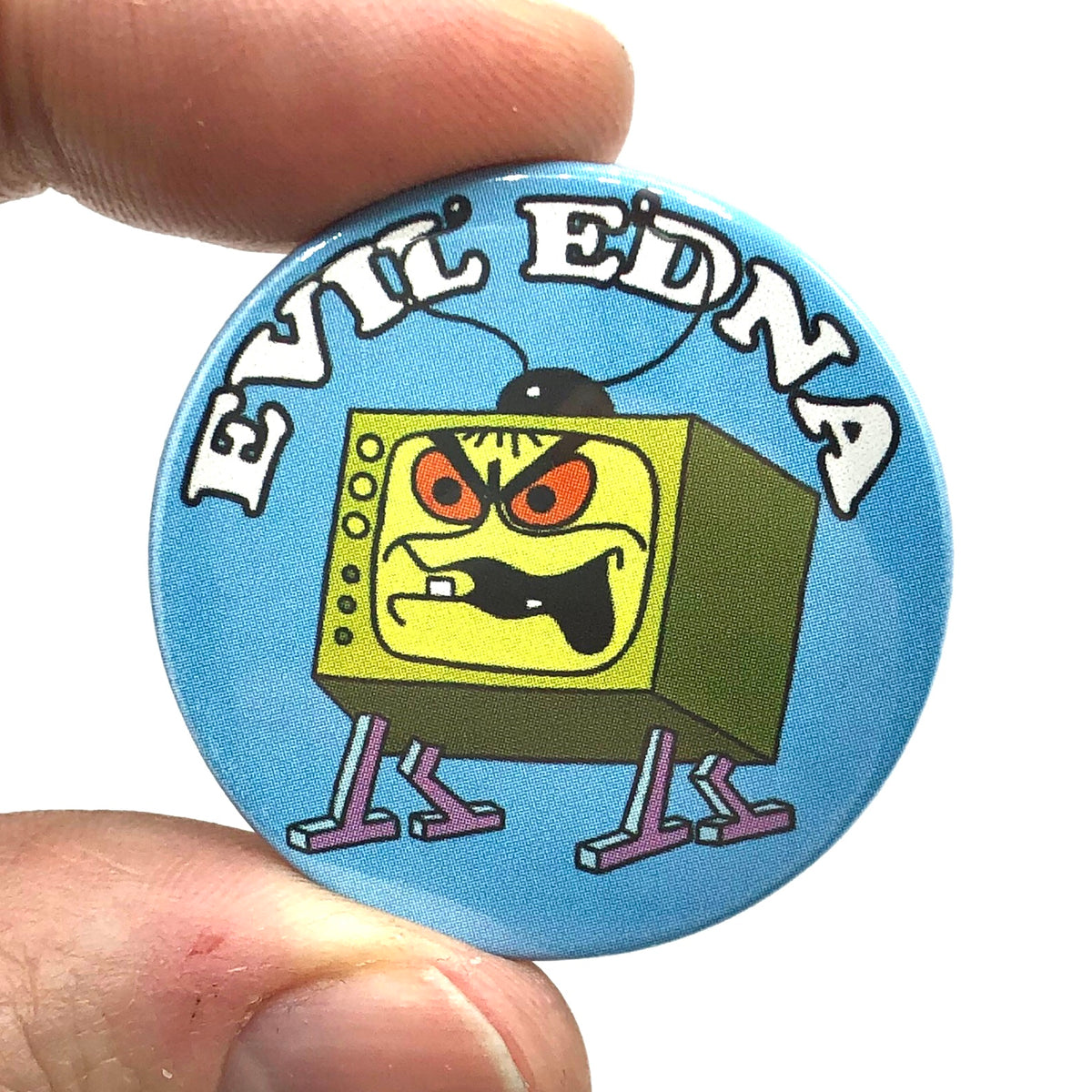 Evil Edna Button Pin Badge is – Bite Your Granny